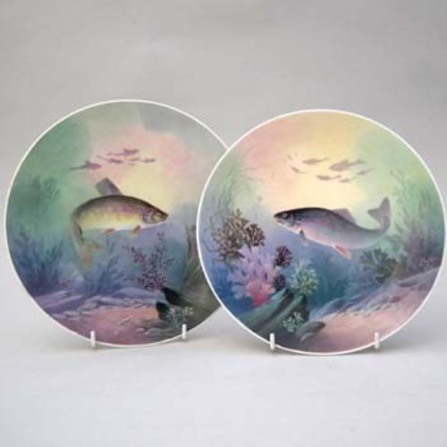 Lot 186 - Pair of Minton plaques by Je Dean, fish.