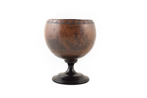 Lot 151 - An 18th century scrimshaw coconut cup